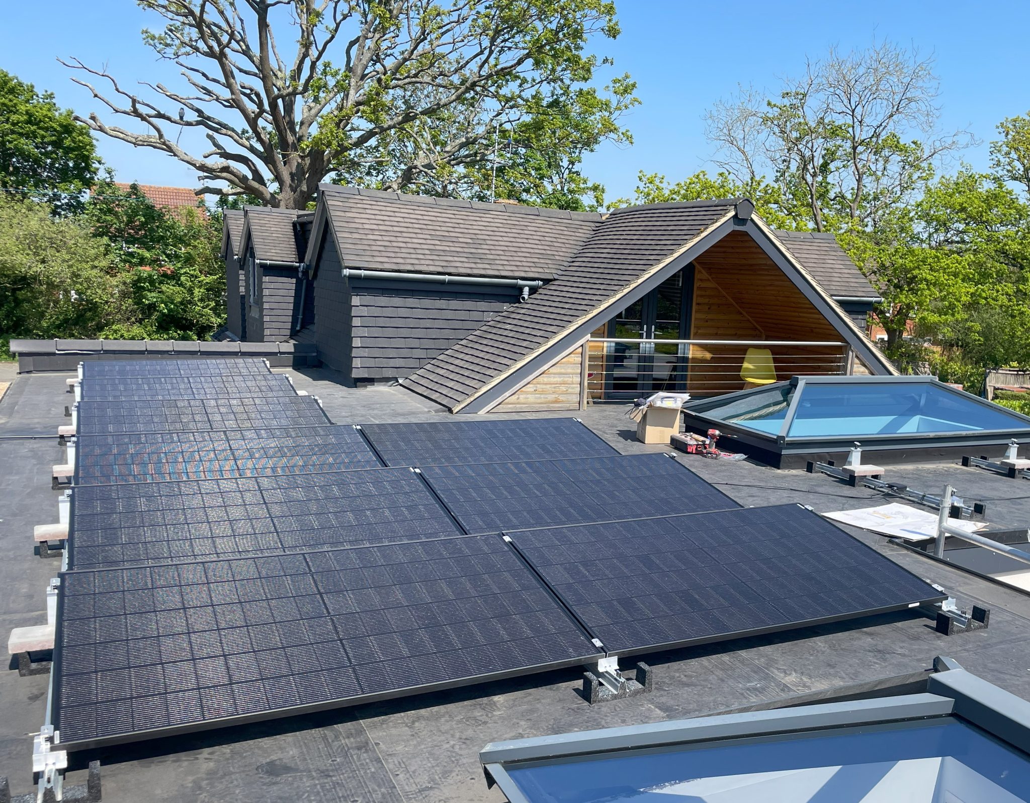 Can I fit solar PV on a flat roof with skylights? - Tethys Energy